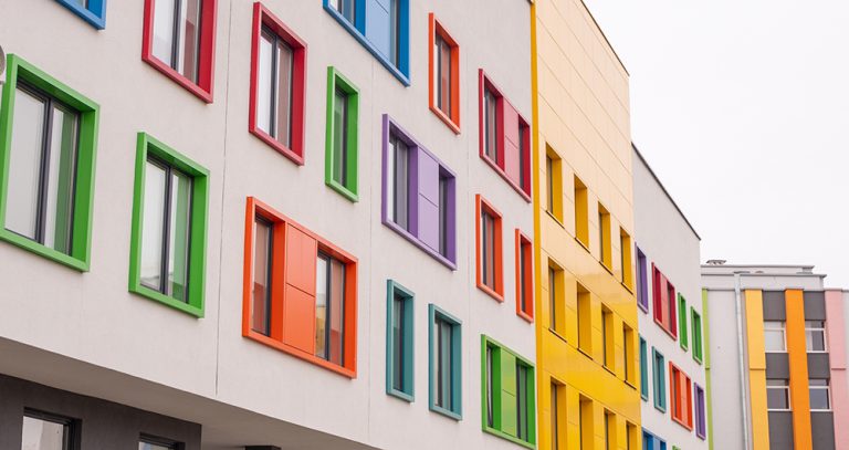 The facade of the building is decorated with different colors of ...